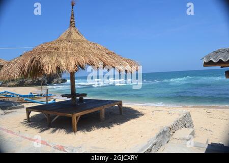 "Indrayanti Beach, Yogyakarta - where golden sands, gentle waves, and ...