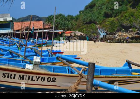 "Indrayanti Beach, Yogyakarta - where golden sands, gentle waves, and ...