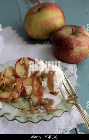 Thyme-fried apples with salted caramel and vanilla ice cream Photo ...