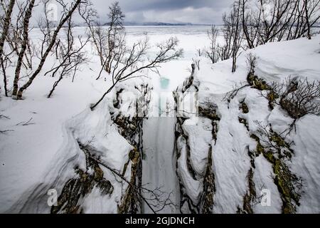 Arctic Silverfallet (or 'Silver Falls') waterfall on the Rakkasjokk ...