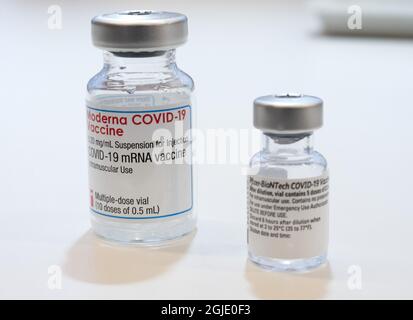 Used Covid-19 vaccine bottles from Moderna, Pfizer-BioNTech and ...