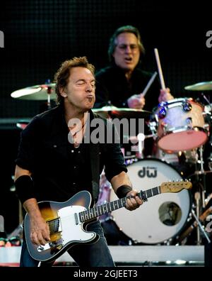 U.S. performer Bruce Springsteen plays his Fender Telecaster guitar ...