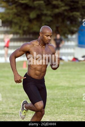 Sprinter Asafa Powell is seen during pre season training at the ...
