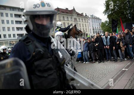 Riots during an election meeting of the right wing Sverige Demokraterna ...
