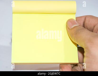 Small yellow paper to write Note Stock Photo - Alamy