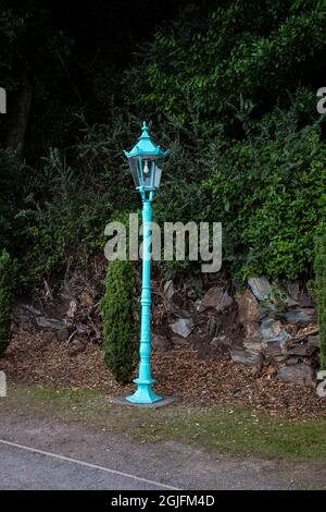 Old gas lamp post converted to electricity in the gardens of a private ...