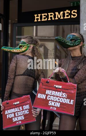 PETA protest against the use of Crocodile skin in fashion at London ...