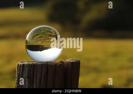 a beautiful landscape photographed through a lens ball Stock Photo - Alamy
