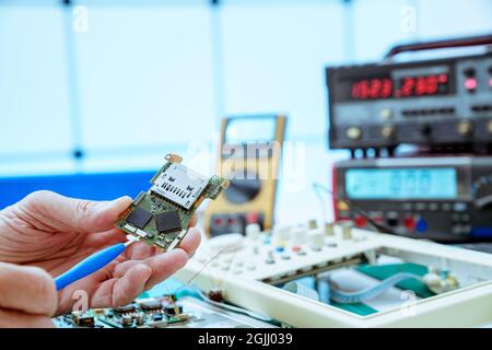 Repair of computer parts in a customer service laboratory Stock Photo ...