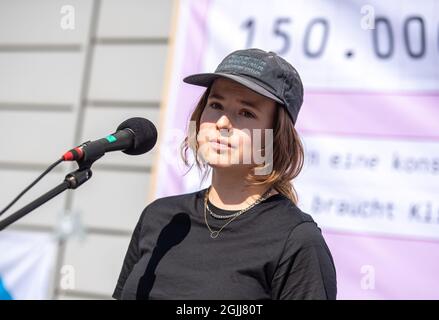 Environmental activist Luisa Neubauer speaks to the crowd during the ...