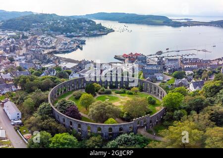 Aerial view from drone of McCaig’s Tower and skyline of Oban, Argyll ...