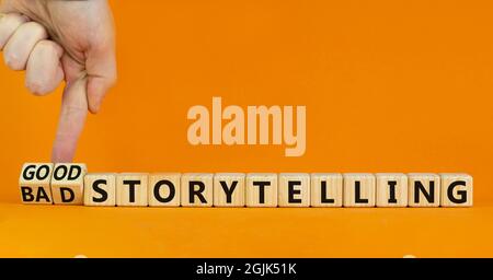 Good or bad storytelling symbol. Businessman turns a wooden cube ...