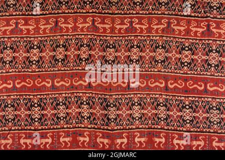 Detail of a warp ikat decorated hinggi from Sumba Indonesia Heraldic ...