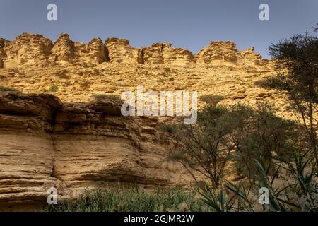 A rock cliff in the Sha'ib Luha valley south of Riyadh, Saudi Arabia ...
