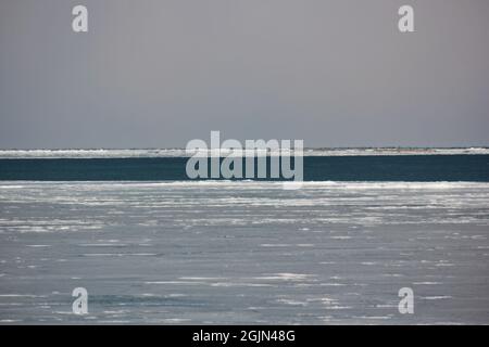 Miles of ice covering a lake during a very cold deep freeze Stock Photo ...