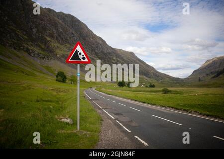 Risk of falling or fallen rocks ahead sign, Gelncoe, Scotland Stock ...