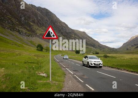 Risk of falling or fallen rocks ahead sign, Gelncoe, Scotland Stock ...