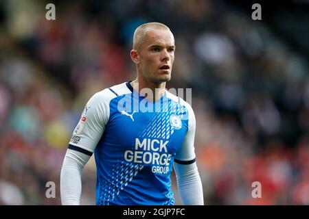Joe Ward #23 of Peterborough United looks for a pass Stock Photo - Alamy