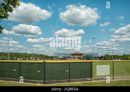 A baseball team gathers for practice on a warm summer day Stock Photo ...