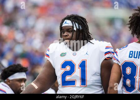 Florida defensive lineman Desmond Watson runs sprints during the school ...