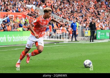 Jordan Gabriel #4 of Blackpool crosses the ball Stock Photo - Alamy