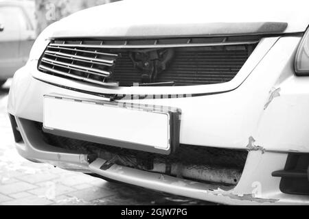 Broken bumper of car involved in accident, closeup Stock Photo - Alamy