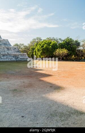 Early morning shadow of the pyramid Kukulkan in the Mayan archeological ...