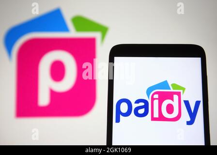 In this photo illustration, Paidy Inc. logo is seen on a smartphone ...