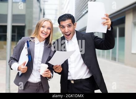 Male with businesswoman are signed successful contract and satisfied of ...