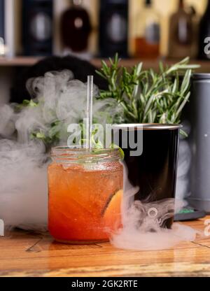 drinking a cold drink or beverage with smoke from cooling down drinking ...
