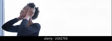 Photo of cheerful young dark skin man hug notebook knowledge smile ...