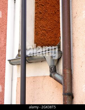 A closeup shot of old rusty thin metal bars on a black background Stock ...