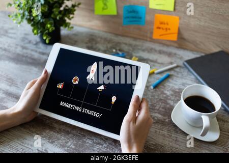 Marketing strategy diagram on device screen. Business concept Stock ...