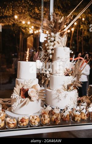 Vertical closeup of the wedding cakes with beautiful decorations Stock ...