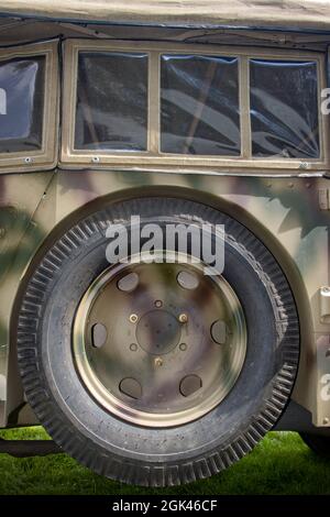 A spare wheel attached to the body of an retro army vehicle Stock Photo ...