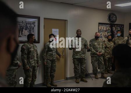 Maj. Gen. Xavier T. Brunson, the I Corps commanding general, presents a ...