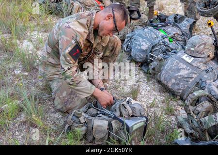 U.S. Army Staff Sgt. Logan Engle, a noncommissioned officer assigned to ...