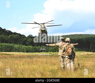 Chinook and humvee Stock Photo - Alamy