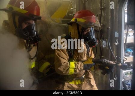 (From right) Engineman 2nd Class Breanna Sainz, Chief Gas Turbine ...