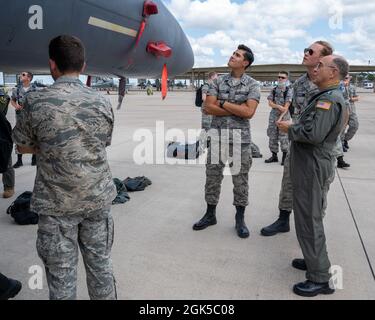 Maj. Gen. Mark Smith talks with Civil Air Patrol students while looking ...