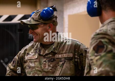 Chief Master Sgt. Thomas Schaefer, 8th FW command chief, left, and Col ...