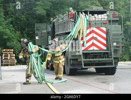Soldiers from the 192nd Firefighter Detachment, 228th Engineer Company ...