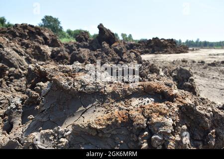 Mounds of ‘Borrow Material’ lay prepositioned at a worksite in Greene ...