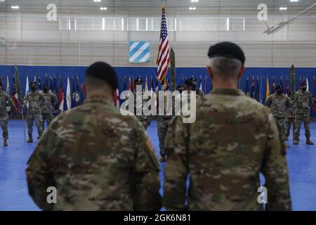Col. Edgardo Ramirez, commander of the 14th Field Hospital, receives a ...