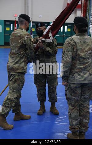 Col. Edgardo Ramirez, commander of the 14th Field Hospital, receives a ...