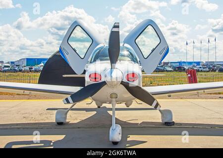Front view of white modern turboprop airliner with close-up of pointed ...
