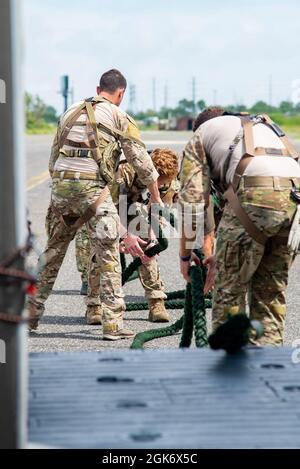 Air crews from two UH-60 Black Hawk helicopters take in the view of the ...