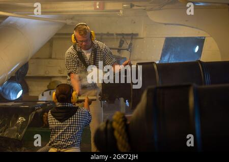 BOSTON (August 20, 2021) Airman Jabari Shabazz, from Atlanta, climbs ...
