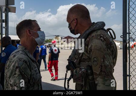 U.S. Navy Rear Adm. Keith Davids, left, commander of U.S. Southern ...