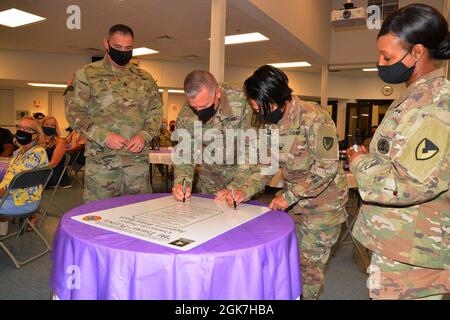 Command Sgt. Maj. Tamisha A. Love (center), Fort Lee garrison command ...